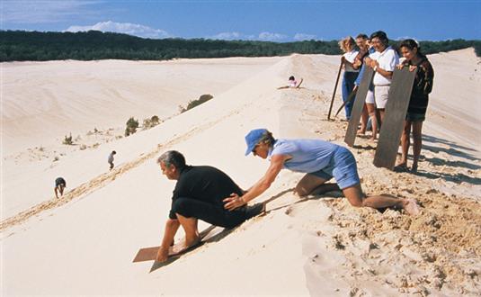 Sand Tobogganing Tour tour with Antilog Vacations at TANGALOOMA Australia