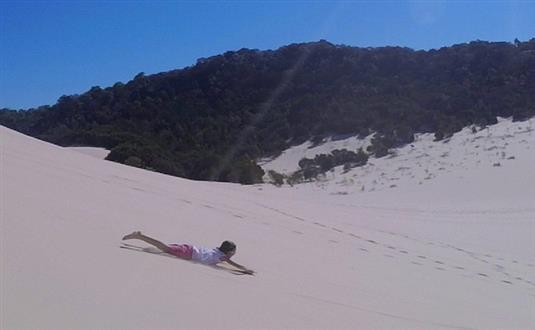 Sand Tobogganing Tour tour with Antilog Vacations at TANGALOOMA Australia